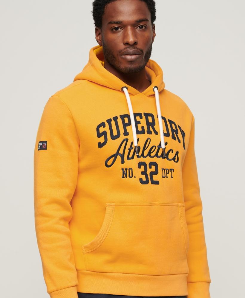 ATHL SCRIPT EMB GRAPHIC MEN'S YELLOW HOODIE